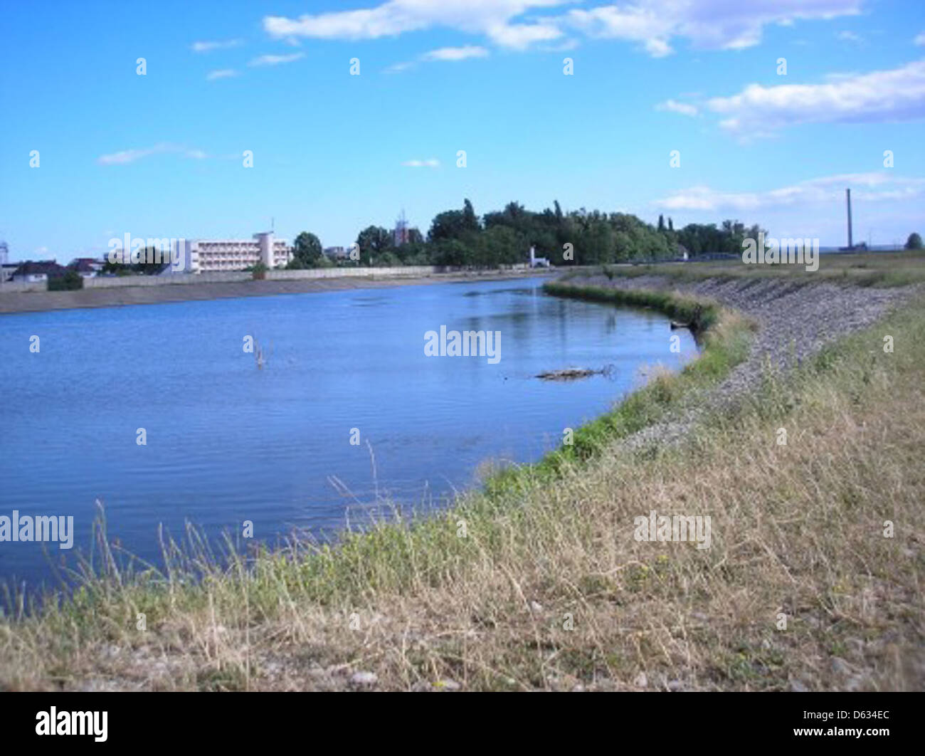 This image shows the flowing water of the Jiu River, capturing its blue ...