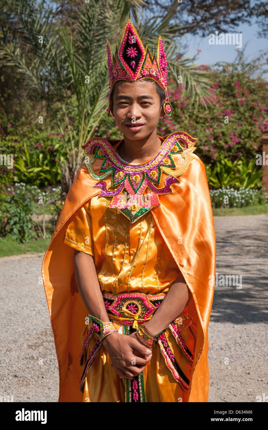 Young man dressed in traditional Bagan costume outside Tharabar Gate ...