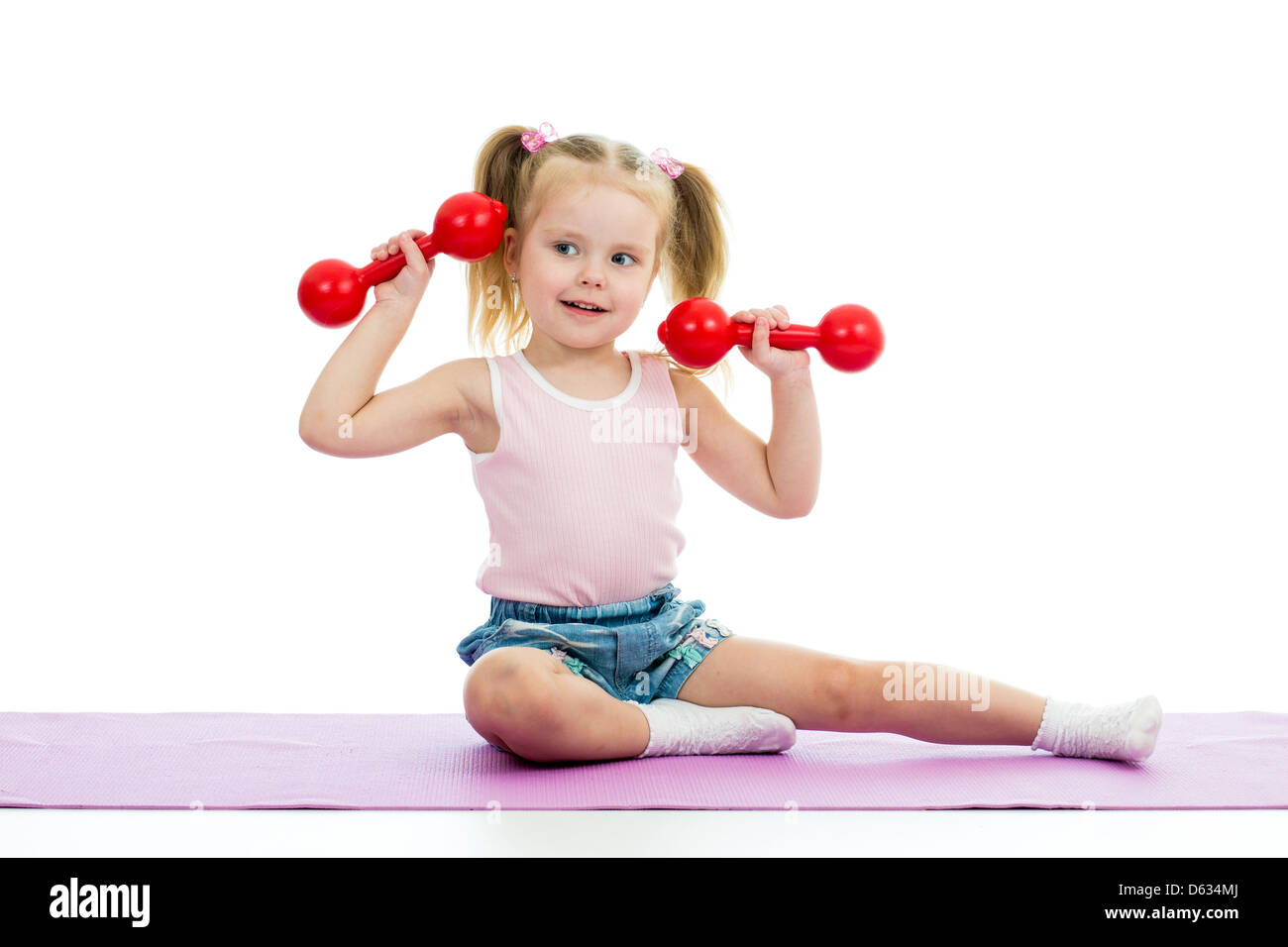 Kid doing exercises with dumbbells Stock Photo - Alamy