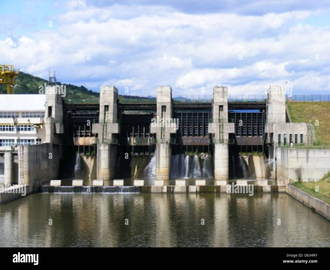 This image depicts a hydro power plant, showcasing its infrastructure ...