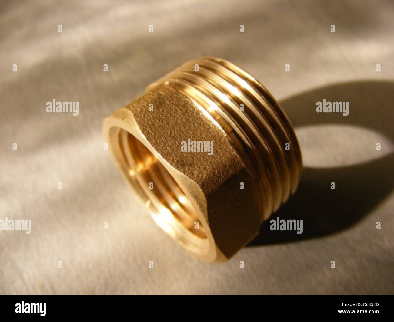 A brass hex bushing is a small but essential component used in plumbing ...