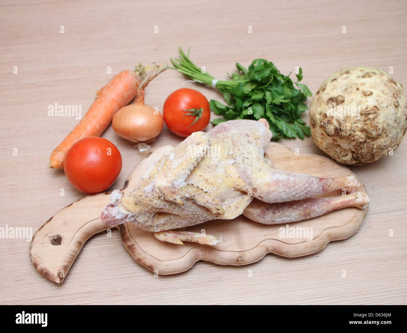 The image shows frozen country chicken with vegetables, a common dish ...