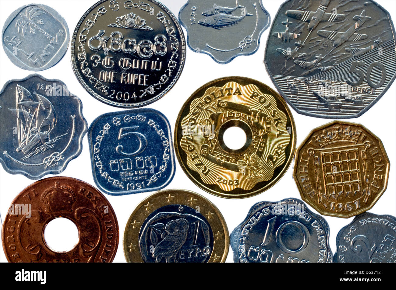 International Coins of different shapes and sizes Stock Photo - Alamy