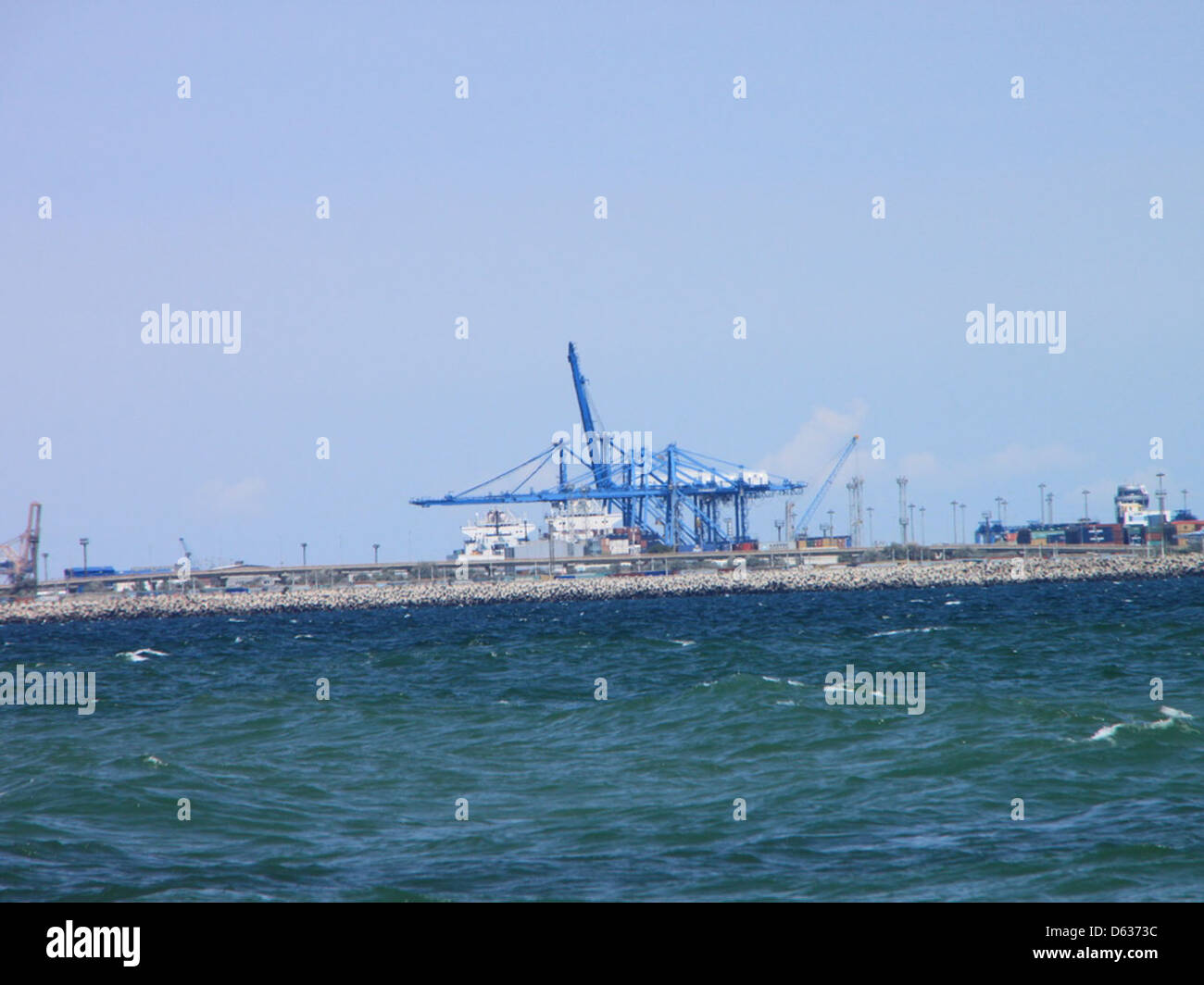 The image shows the port and shipyard area in Constanta, Romania. It ...