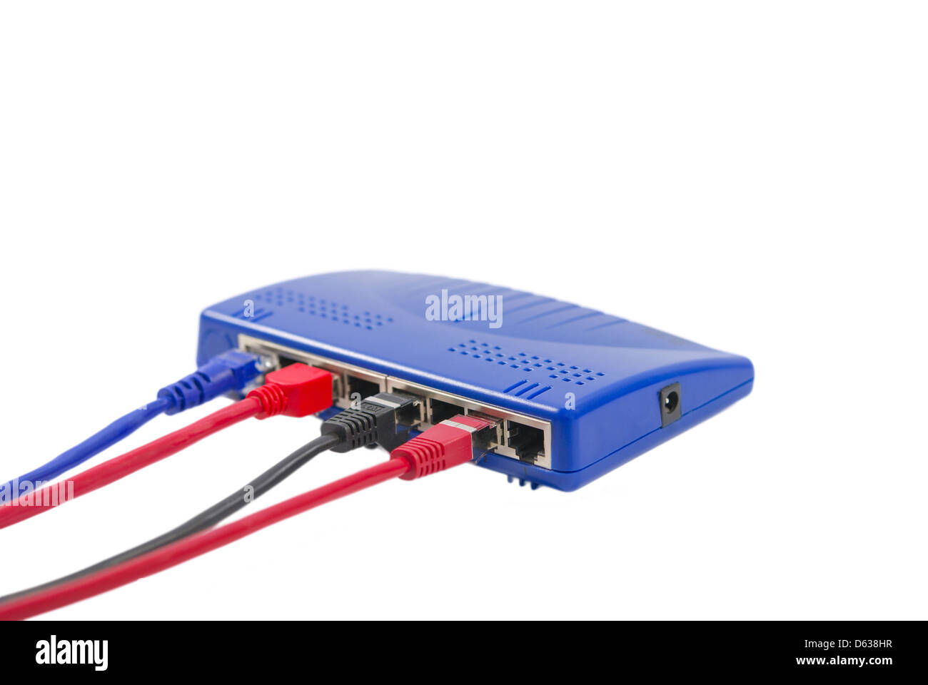 Blue ethernet switch with multicolor cables isolated on white ...