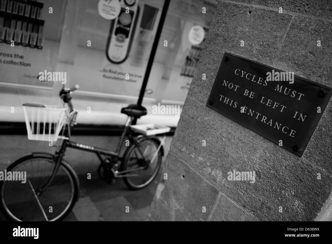 Bicycle left in entrance Stock Photo - Alamy
