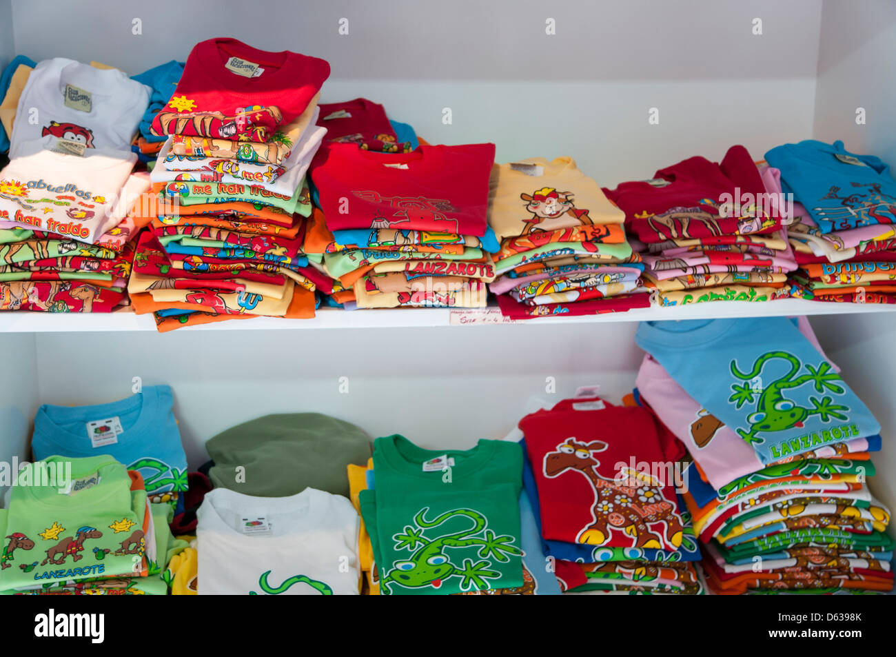 shirts with designs and many colors Stock Photo - Alamy