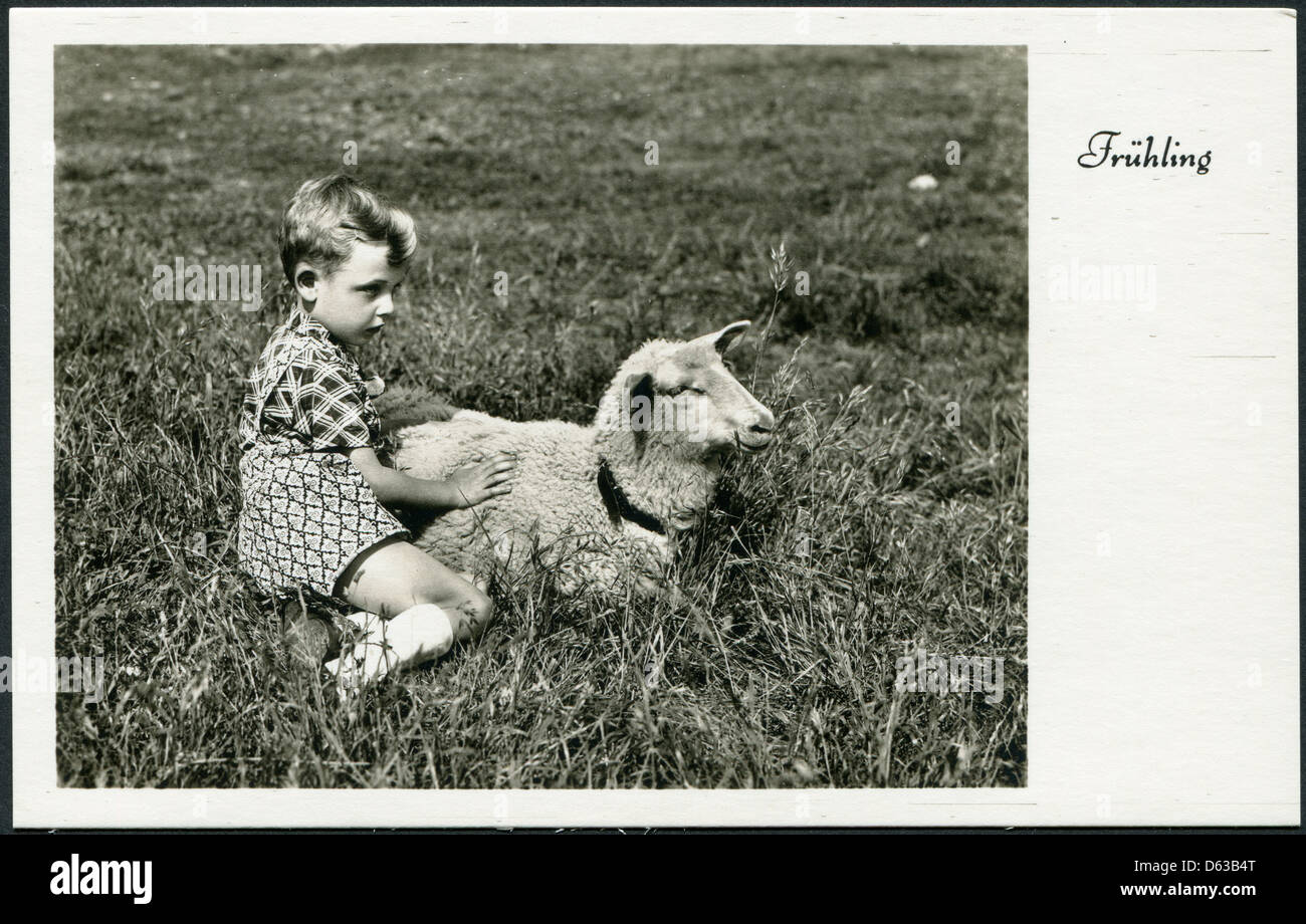 Old German postcard 1938. The boy on the field with the lamb ...