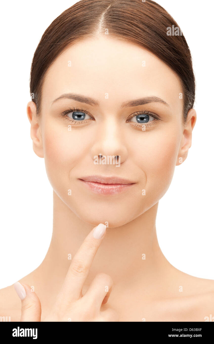 woman touching her chin Stock Photo - Alamy