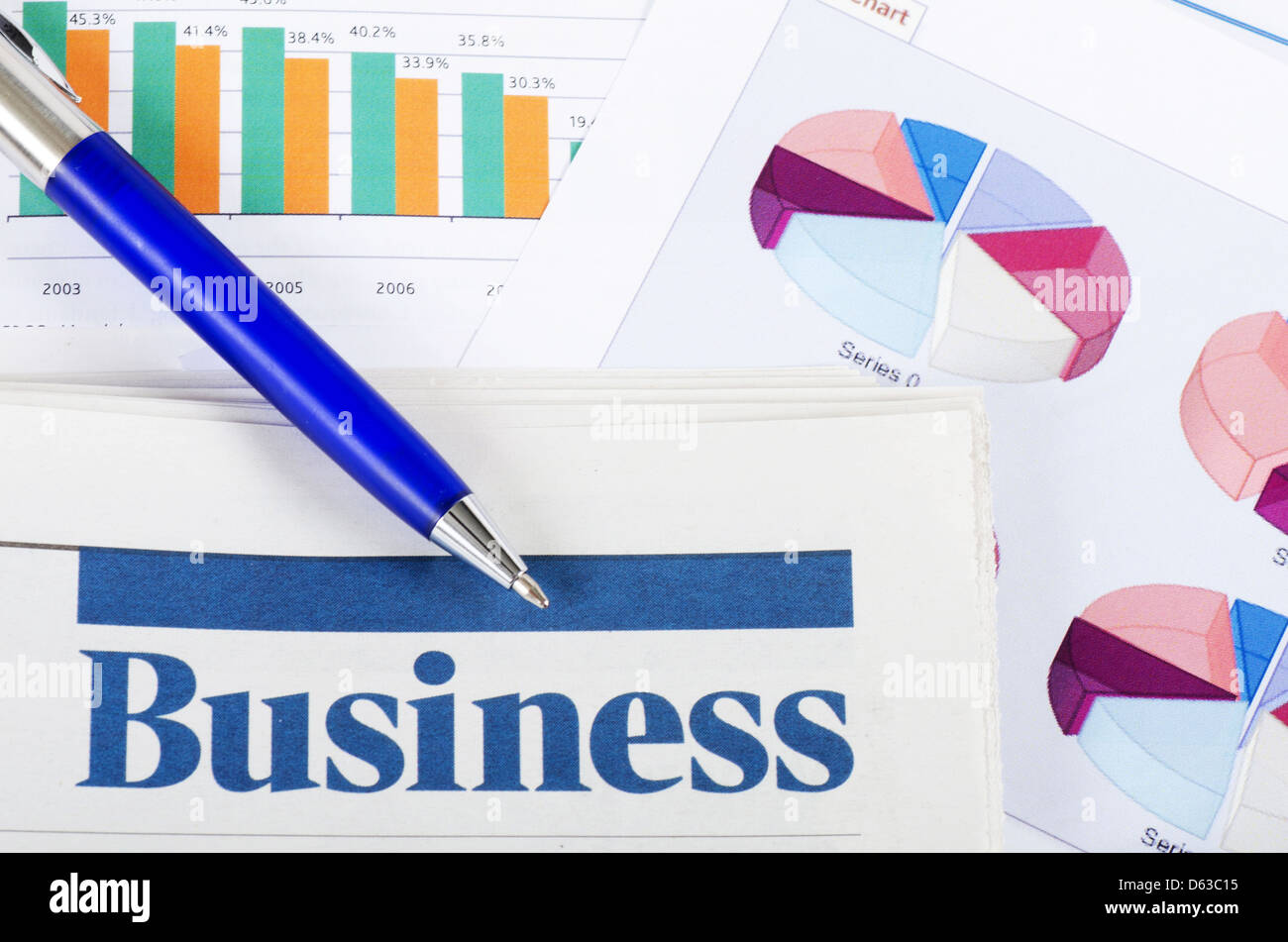 Business the newspaper with chart Stock Photo - Alamy