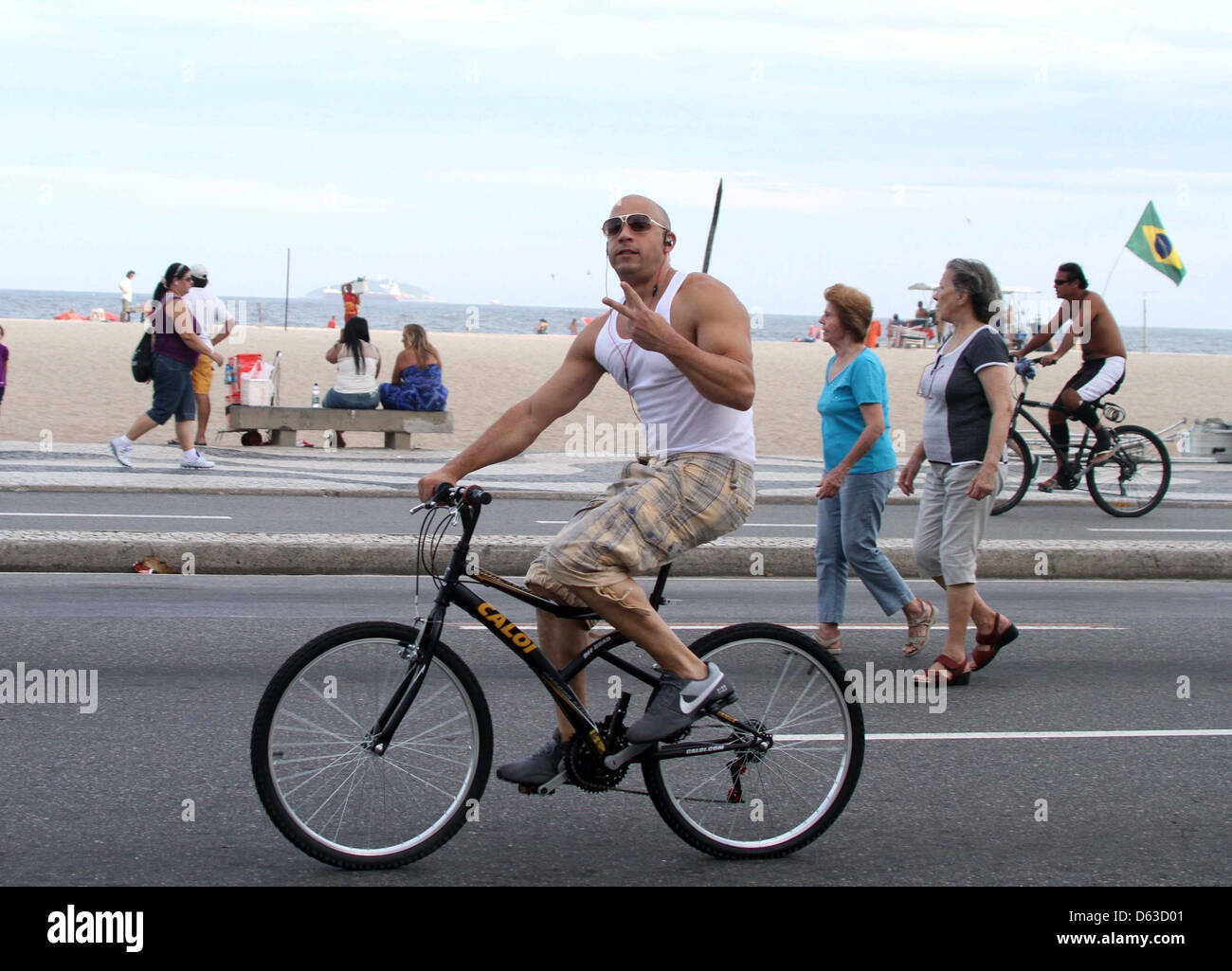 Vin Diesel tours Copacabana on a bicycle with his bodyguards Rio de ...