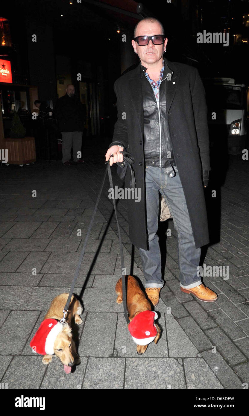 Gavin Friday U2 band members Bono and The Edge celebrate their holiday ...