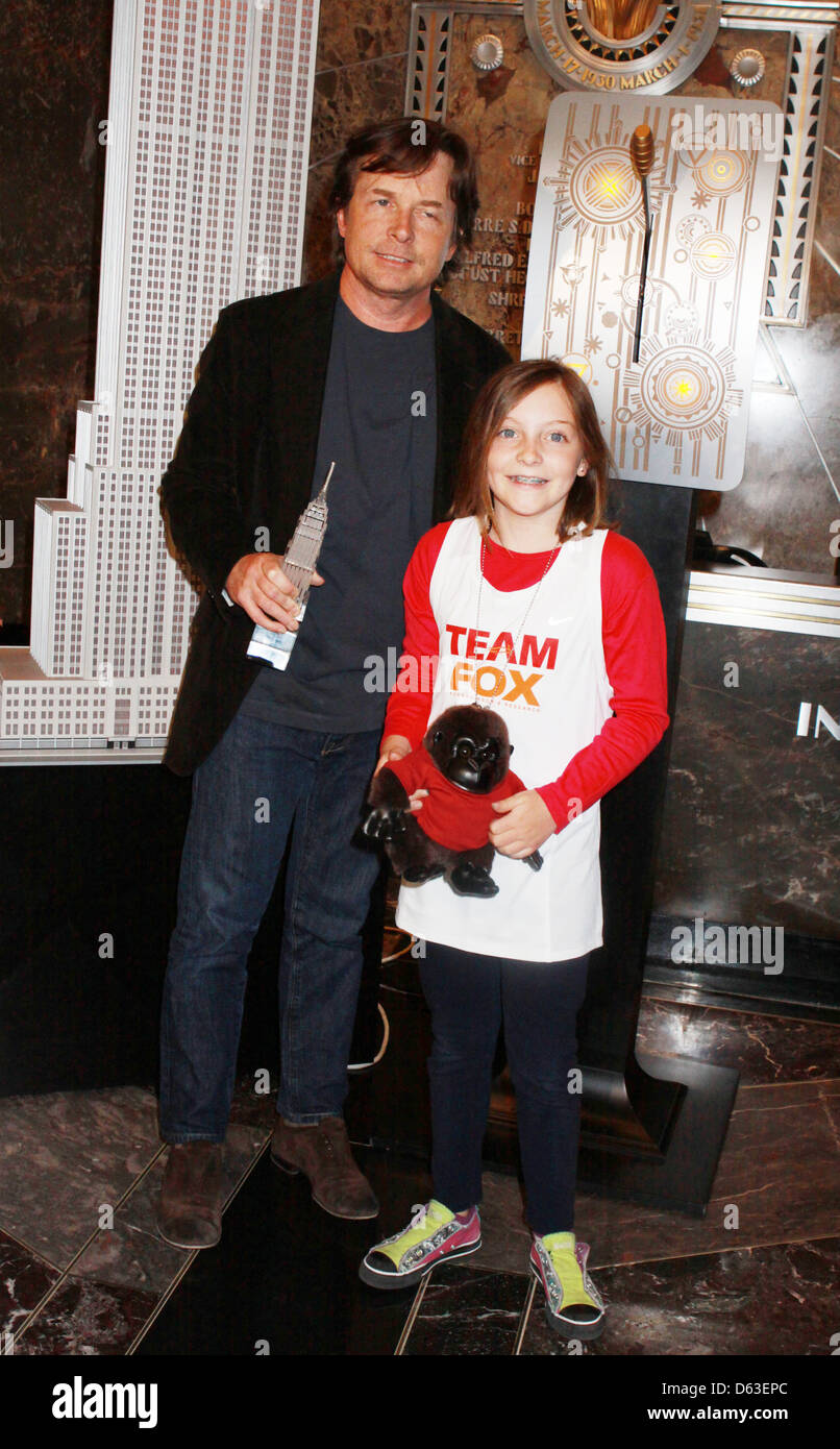 Michael J. Fox and his daughter Esme Fox light the Empire State ...