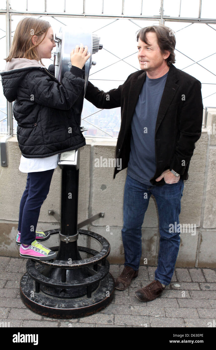 Michael J. Fox and his daughter Esme Fox light the Empire State ...