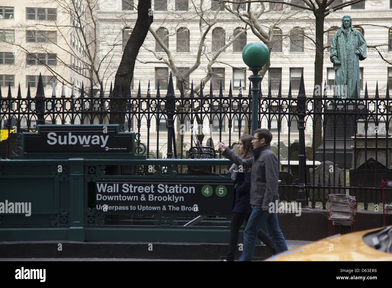 Wall Street subway station entrance along Broadway in the Financial ...