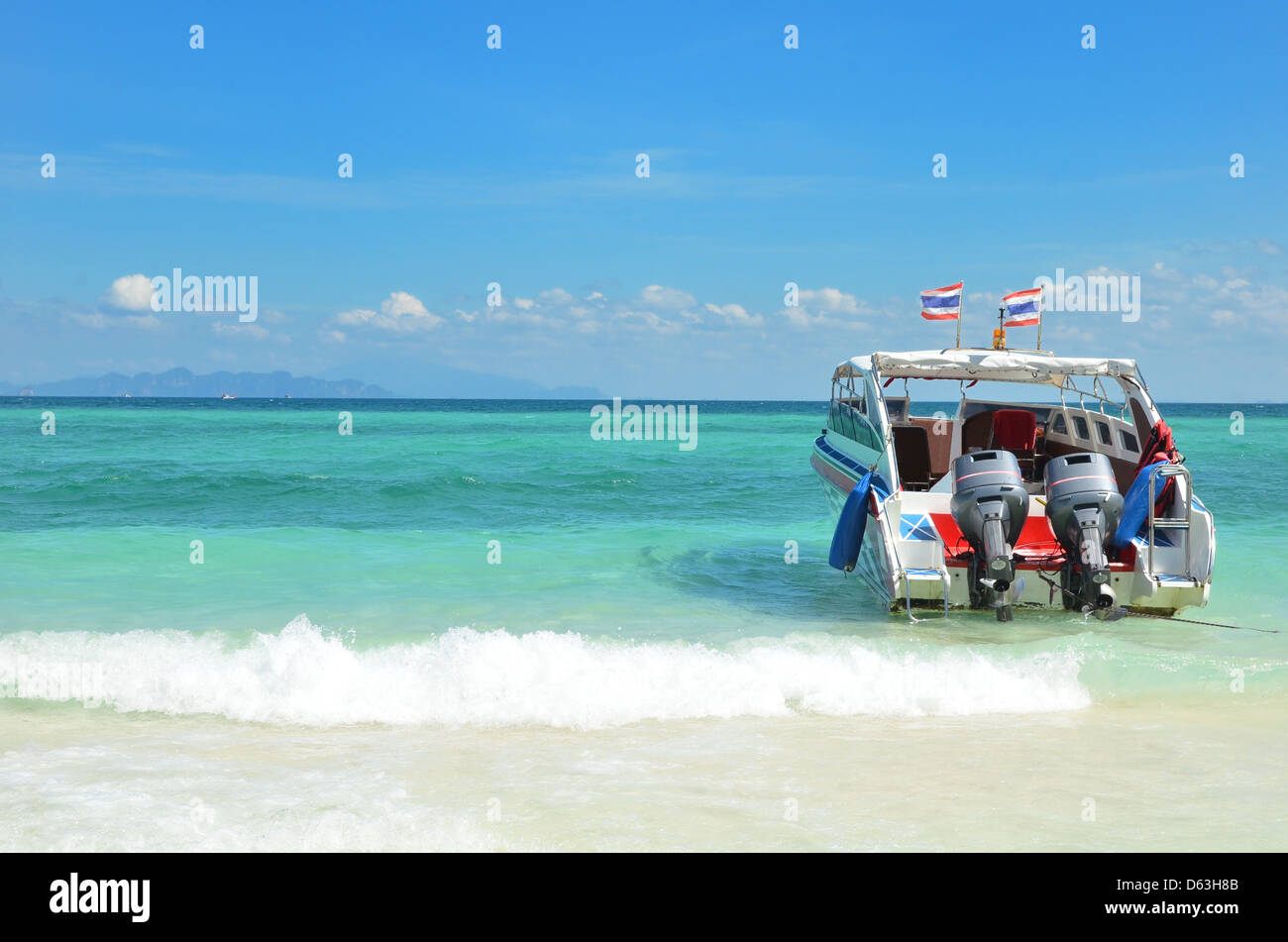 Speed boat dock in the summer sea in Thailand Stock Photo - Alamy