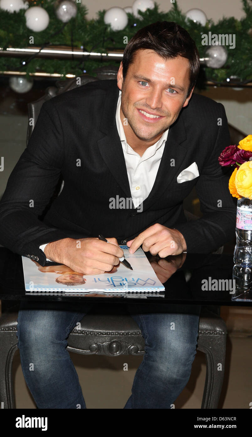 Mark Wright signs his calendar at Selfridges London, England - 15.12.11 ...
