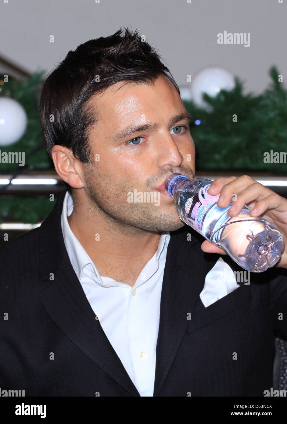 Mark Wright signs his calendar at Selfridges London, England - 15.12.11 ...