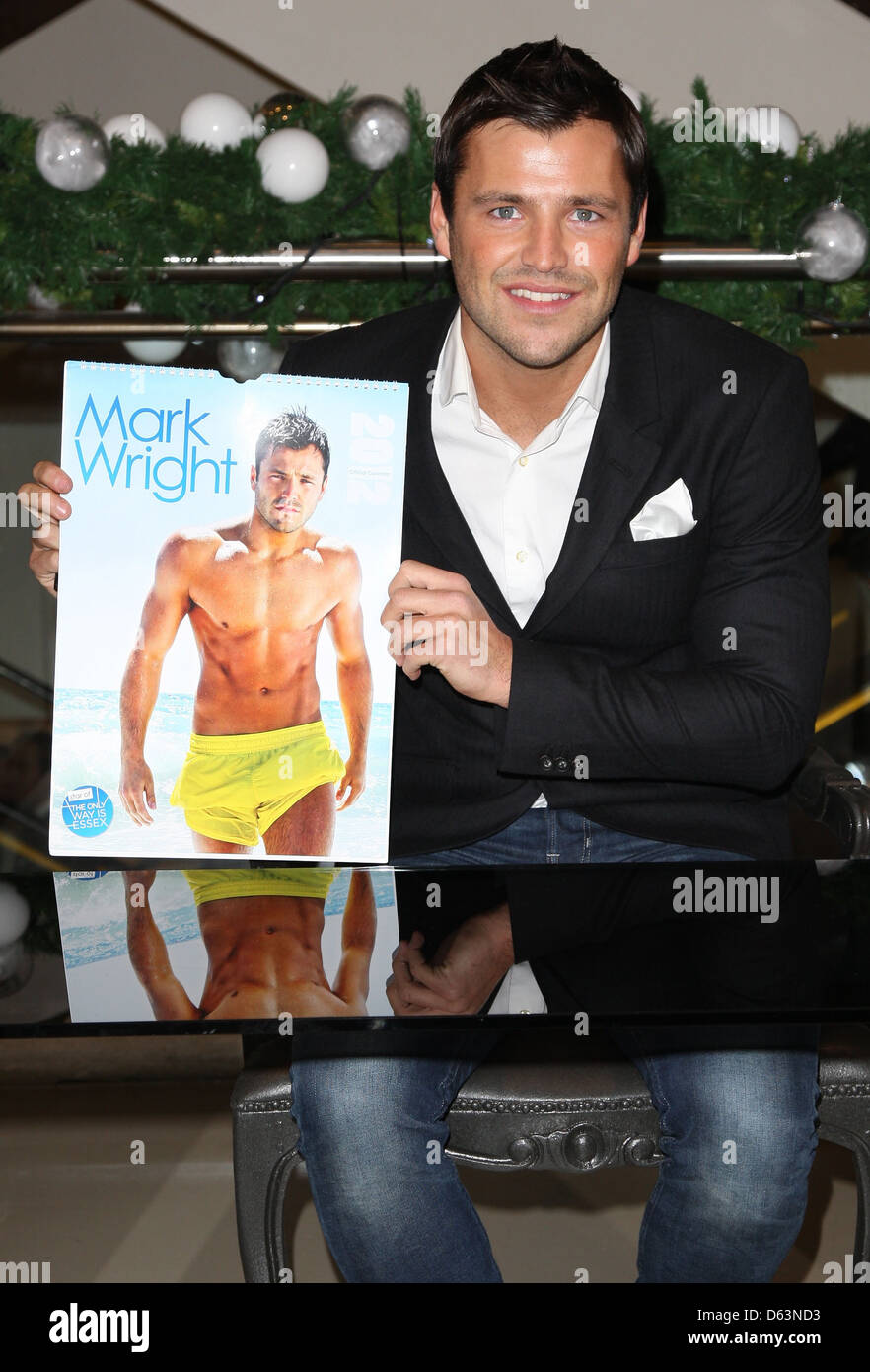 Mark Wright signs his calendar at Selfridges London, England - 15.12.11 ...