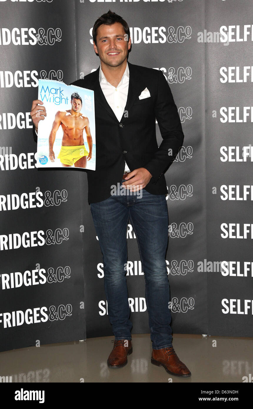 Mark Wright signs his calendar at Selfridges London, England - 15.12.11 ...