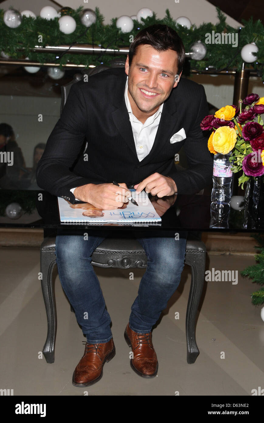 Mark Wright signs his calendar at Selfridges London, England - 15.12.11 ...