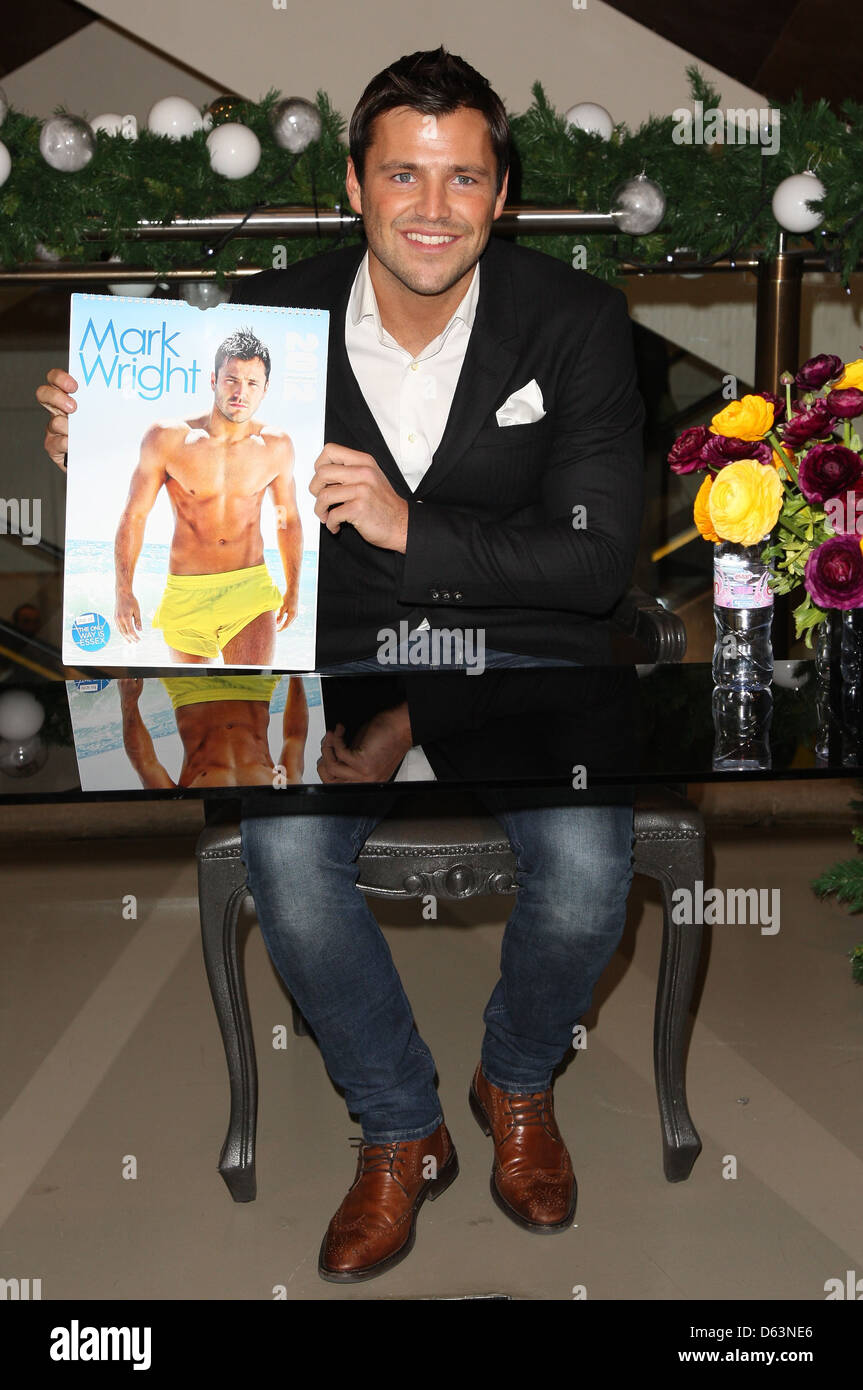 Mark Wright signs his calendar at Selfridges London, England - 15.12.11 ...