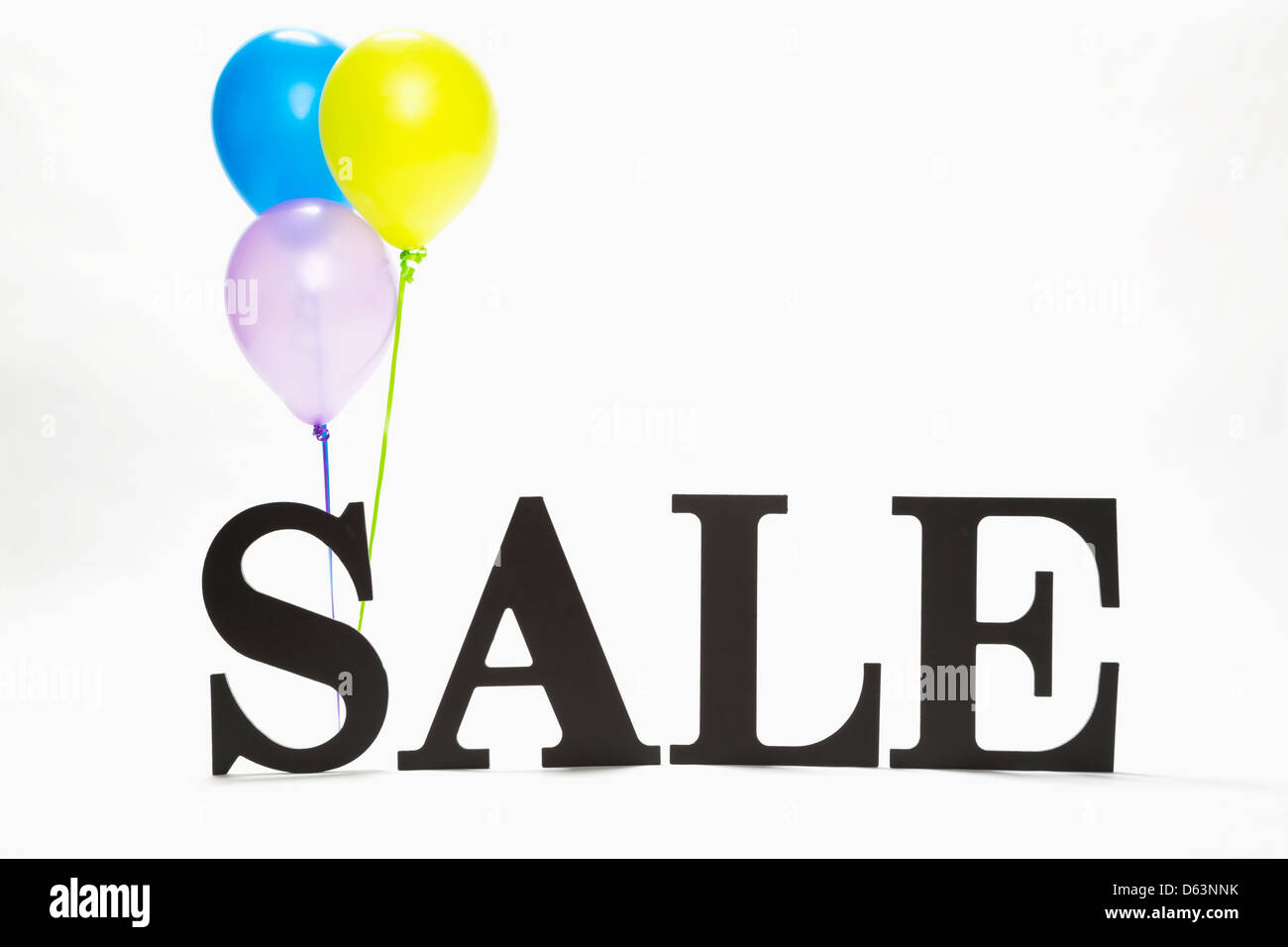 Sale sign with balloons Stock Photo - Alamy