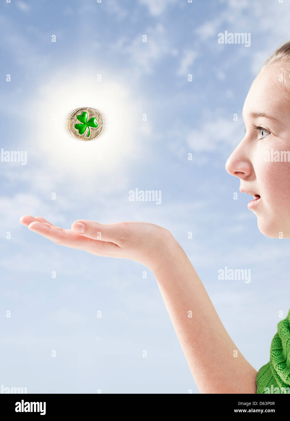 Girl with magic clover Stock Photo - Alamy