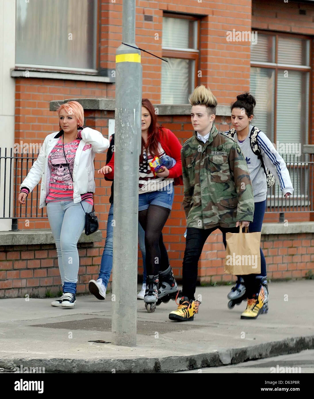 Edward Grimes of Jedward walking with fans after leaving The Green Room ...
