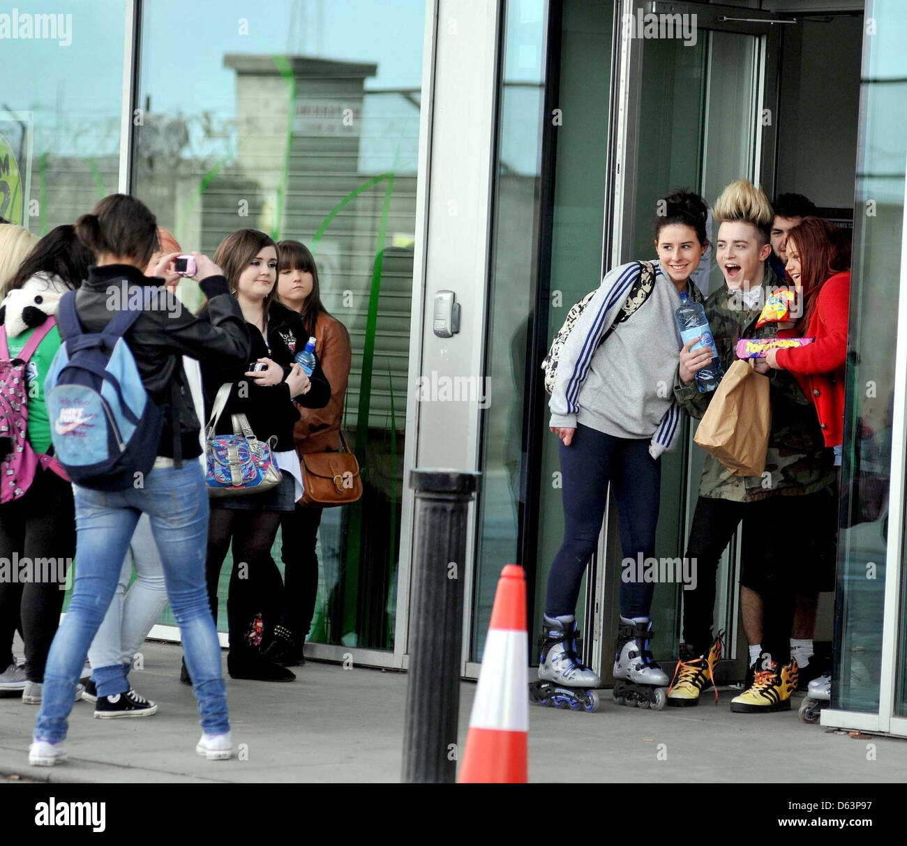 Edward Grimes of Jedward posing with fans after leaving The Green Room ...