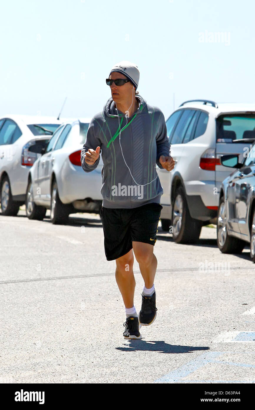 Matthew McConaughey 'The Lincoln Lawyer' star starting a 4 mile run along the beach while ...