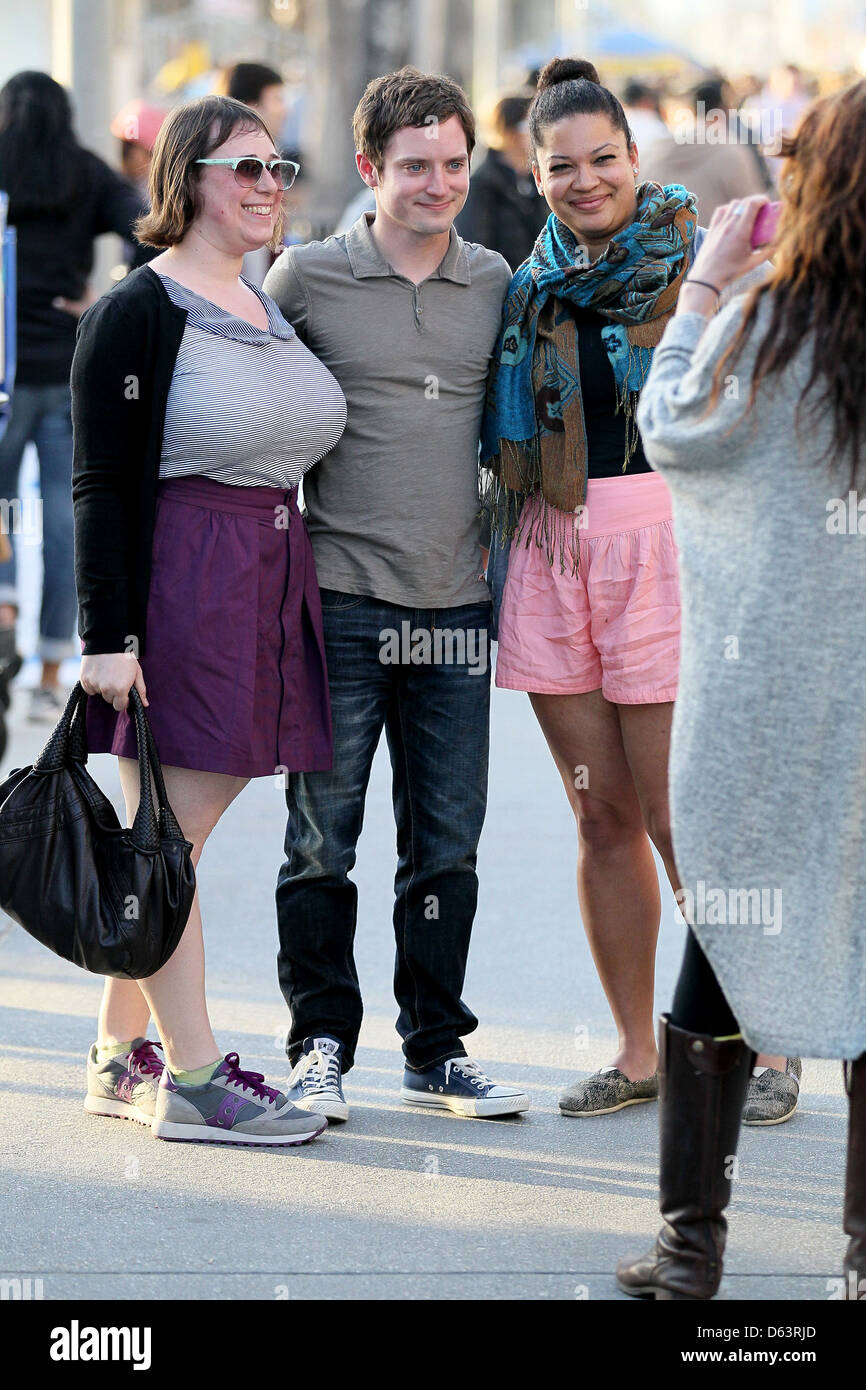 Elijah Wood posing with fans on the set of his new television project ...