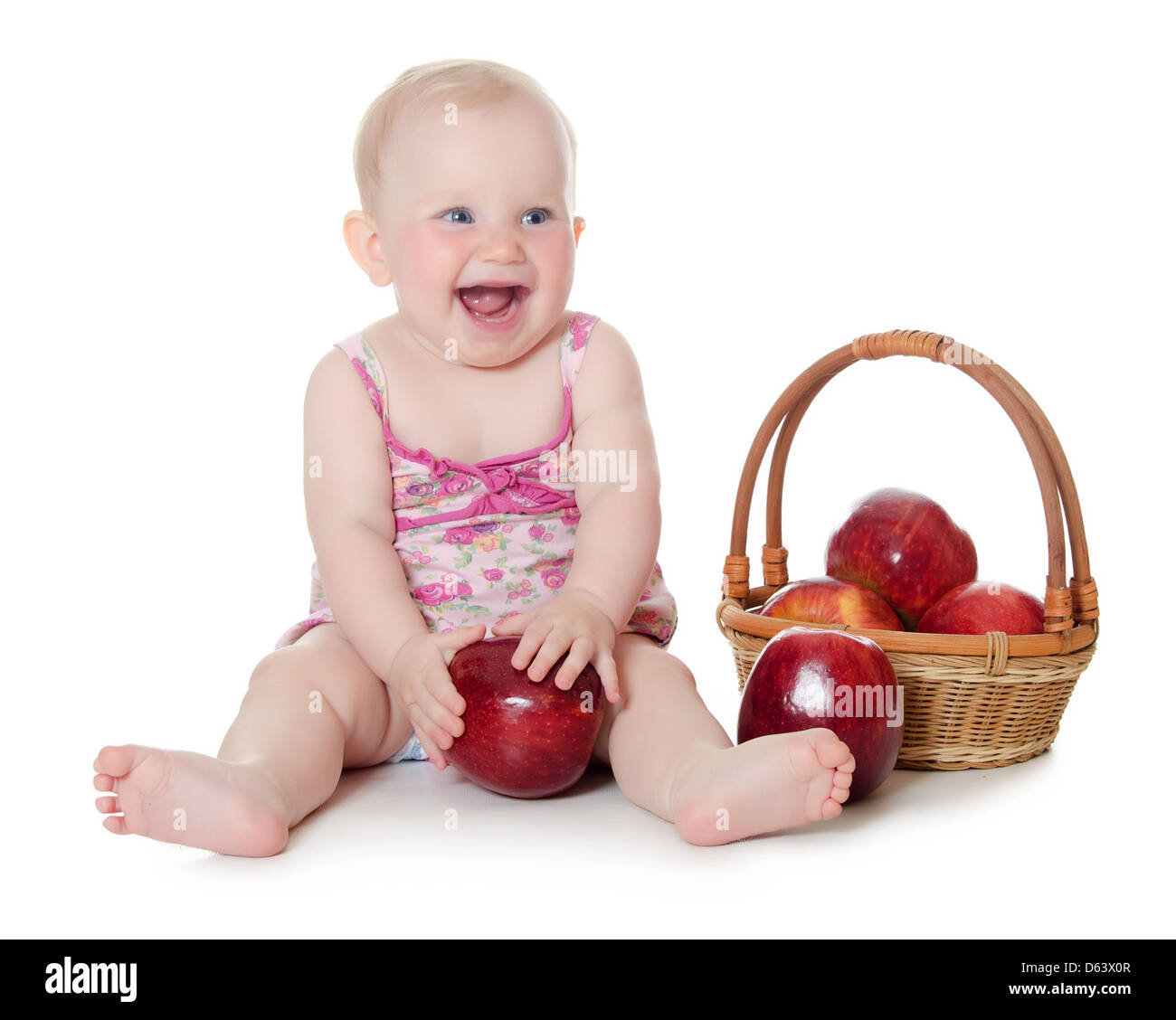The little baby with red apples Stock Photo - Alamy