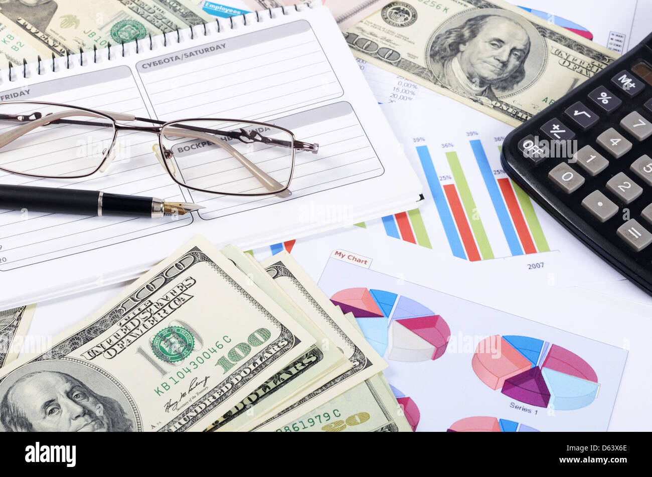 Banknotes of dollar with chart Stock Photo - Alamy