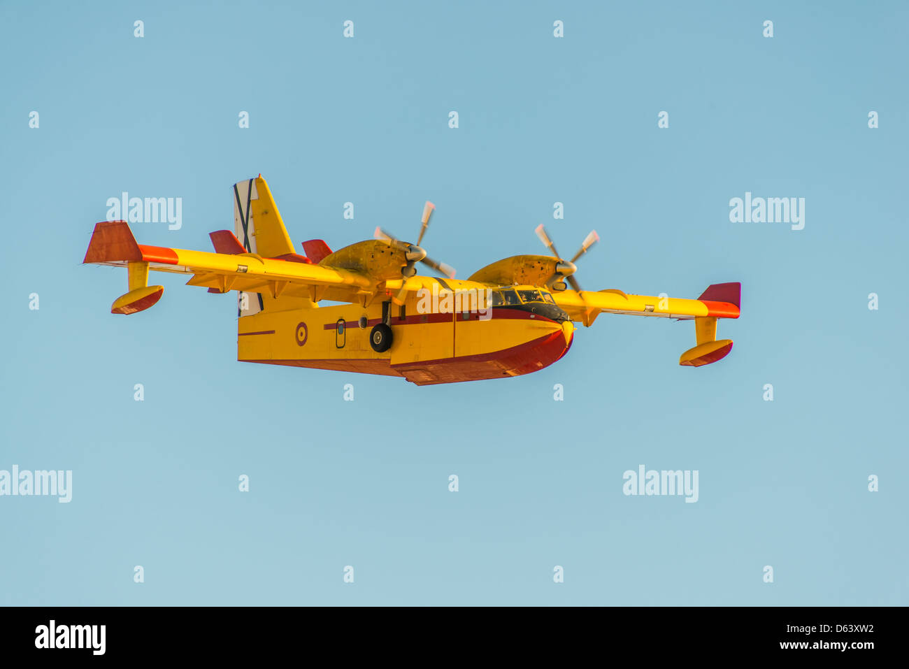 Firefighter airplane on sky background Stock Photo - Alamy