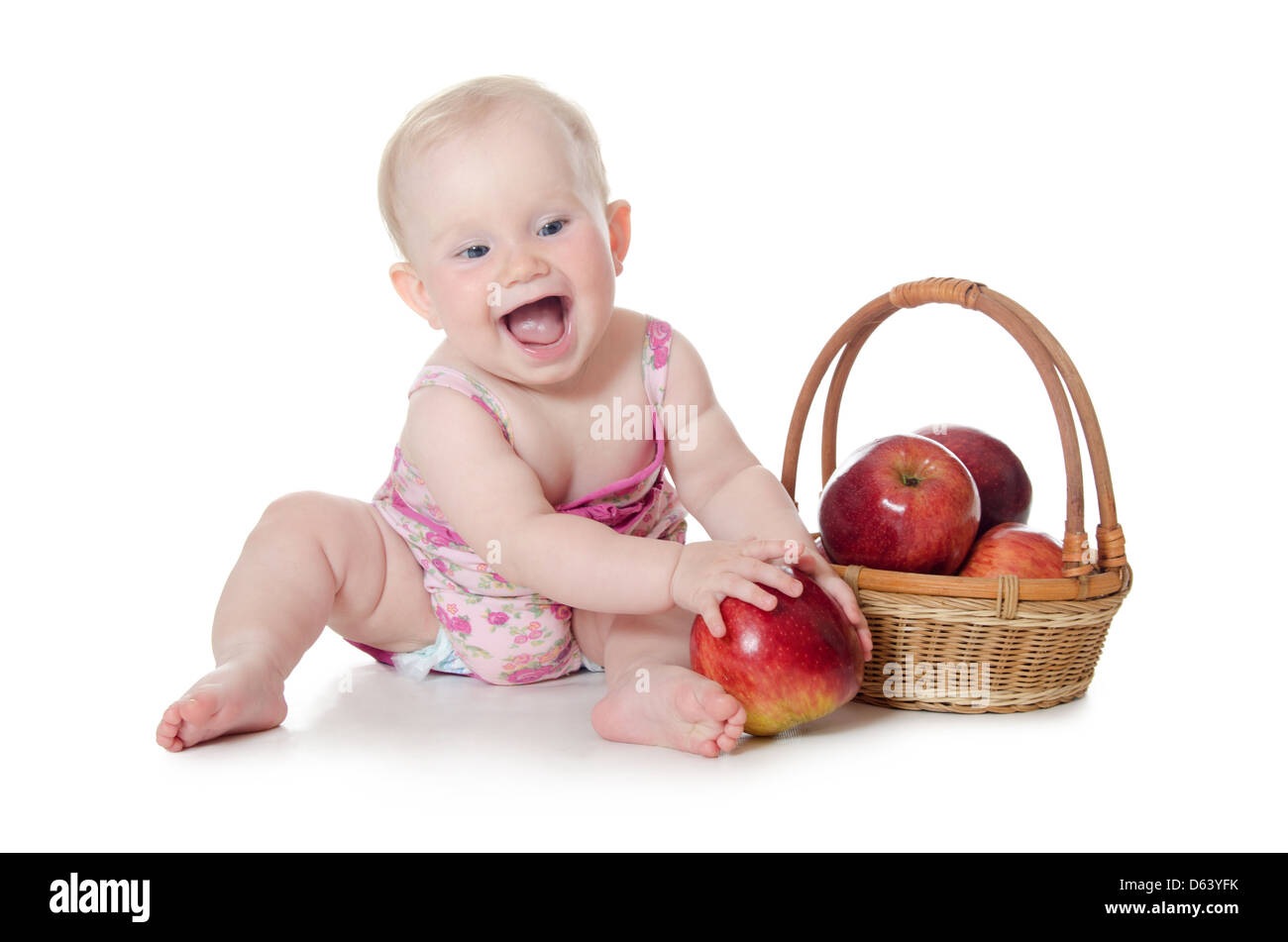 The little baby with red apples Stock Photo - Alamy