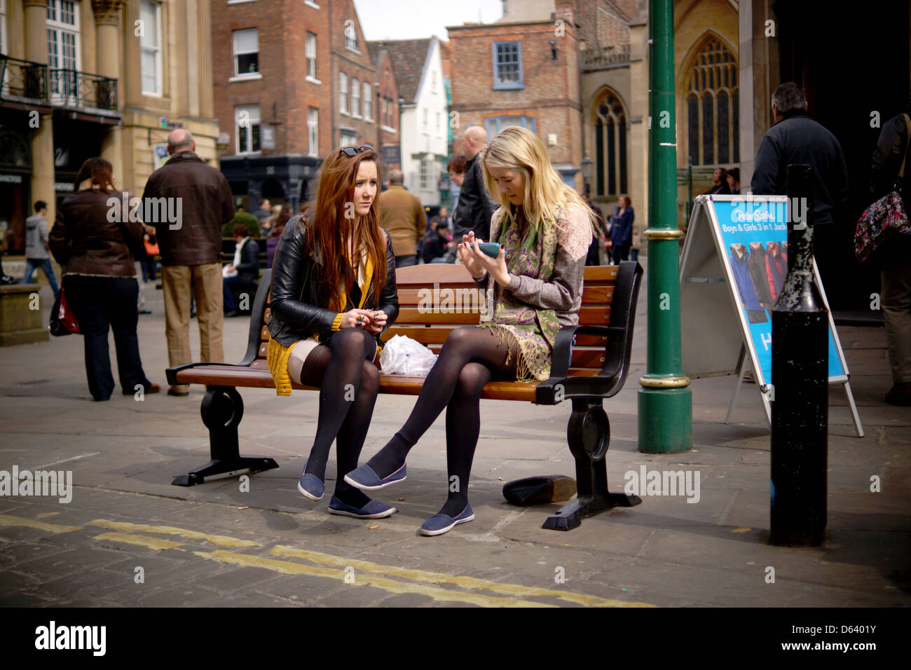Woman sat on a bench hi-res stock photography and images - Alamy