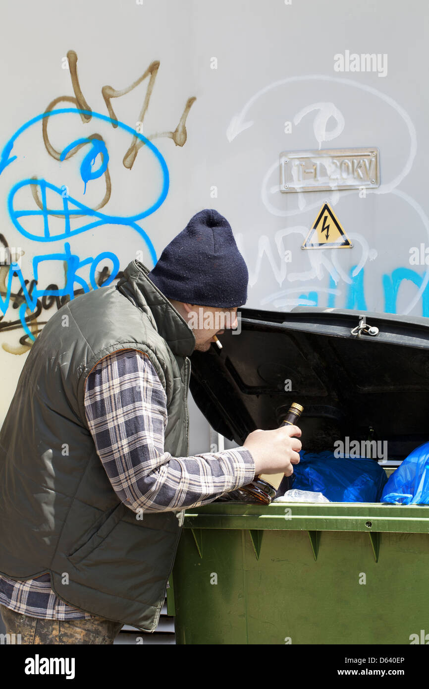 Dumpster and man hi-res stock photography and images - Alamy