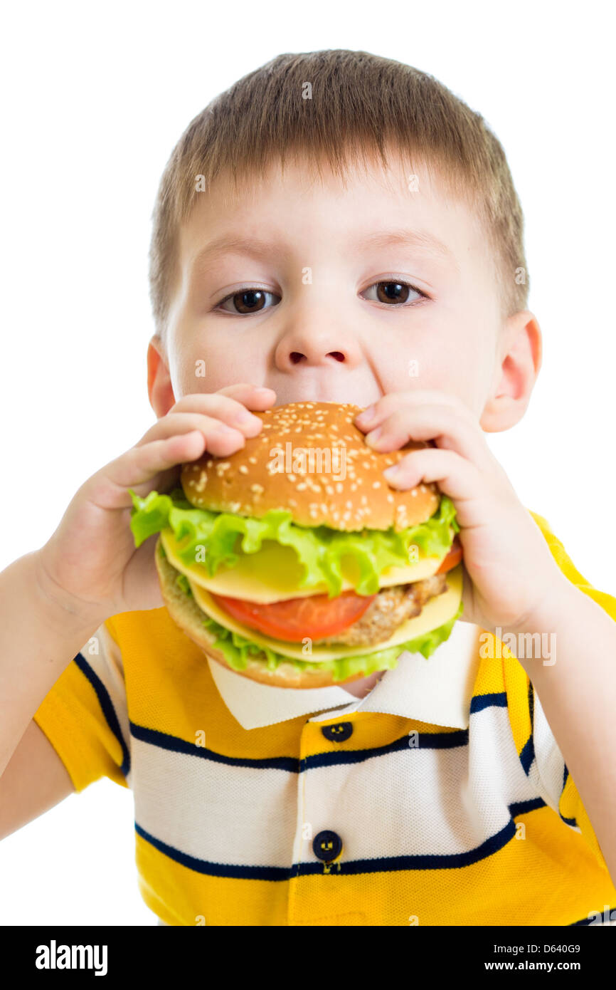 Kid boy eating delicious hamburger Stock Photo - Alamy