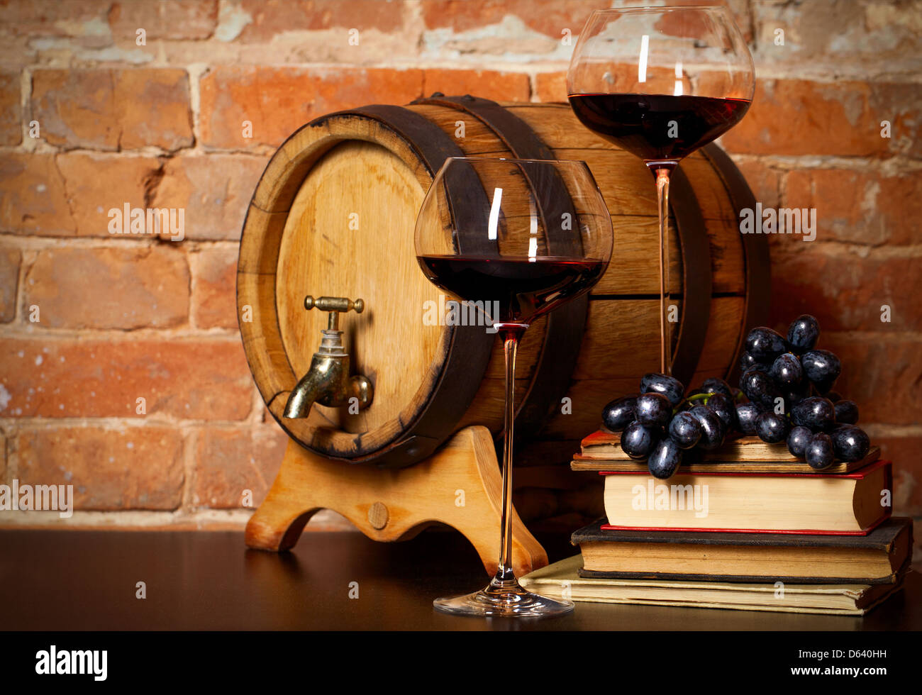 Retro still life with red wine and barrel Stock Photo - Alamy