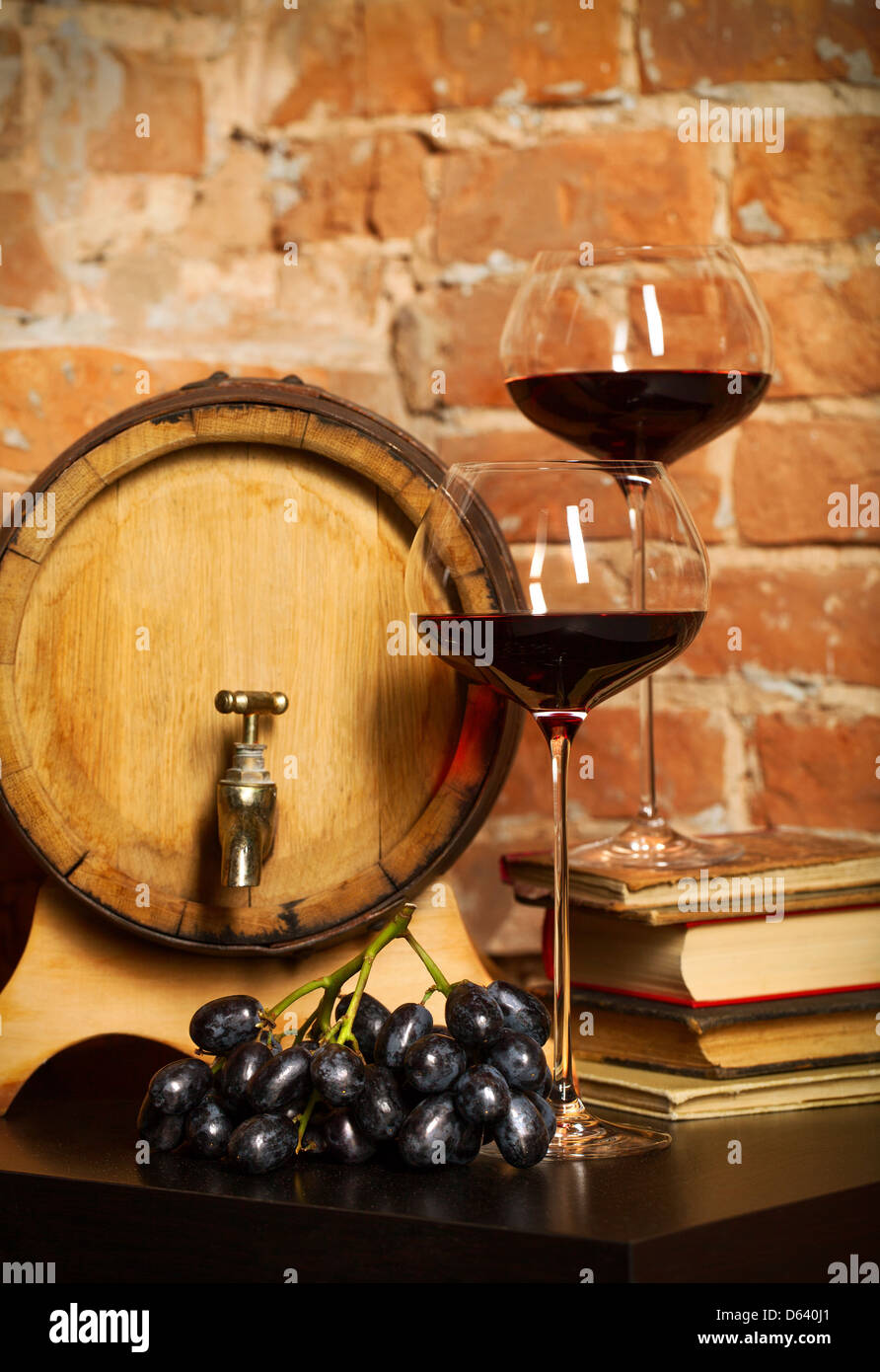 Retro still life with red wine and barrel Stock Photo - Alamy