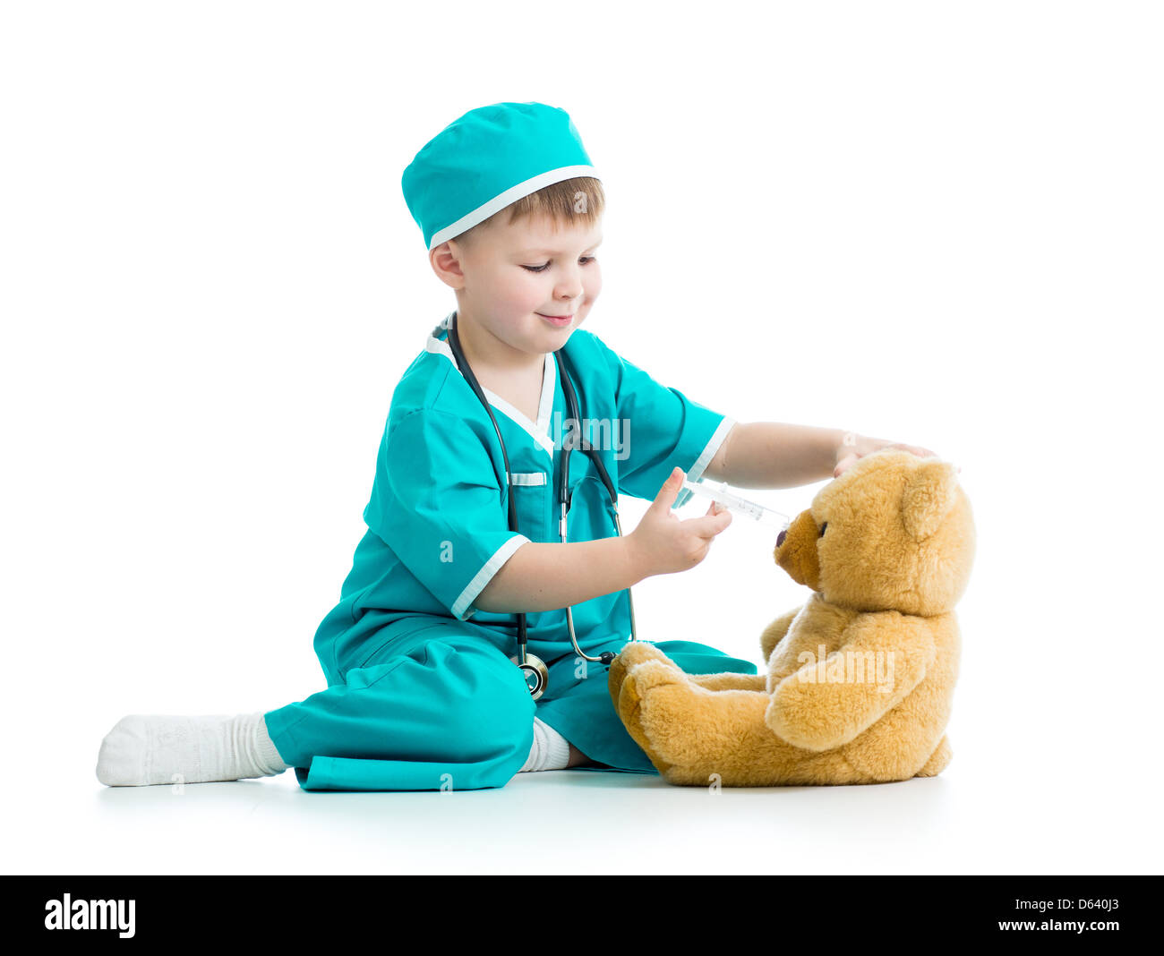 boy kid playing doctor with toy Stock Photo - Alamy