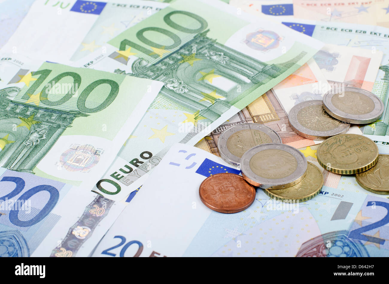 Various Euro currency bills and coins Stock Photo - Alamy