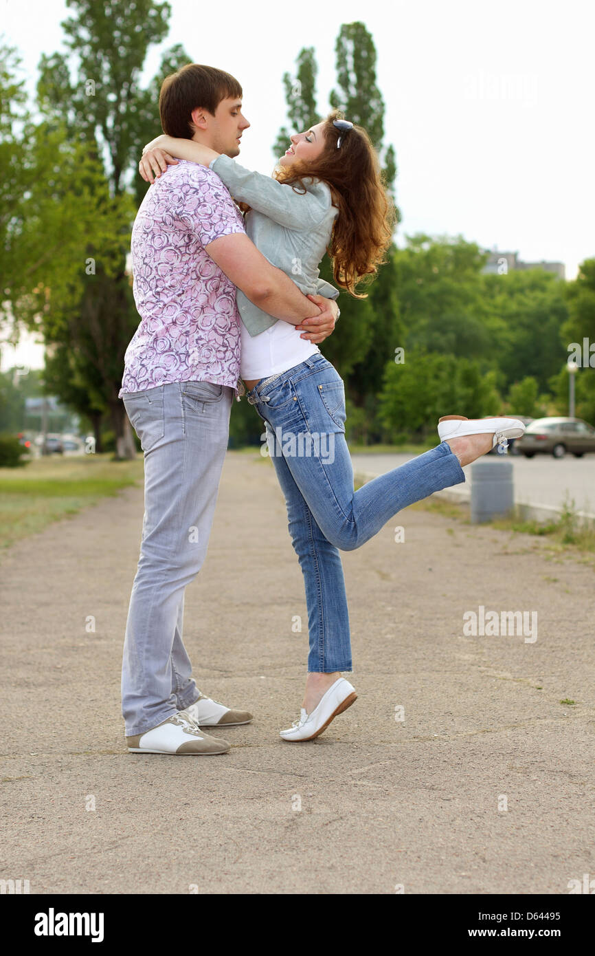Couple of playful young people Stock Photo - Alamy