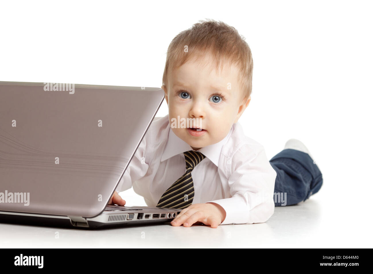 Child using a laptop Stock Photo - Alamy
