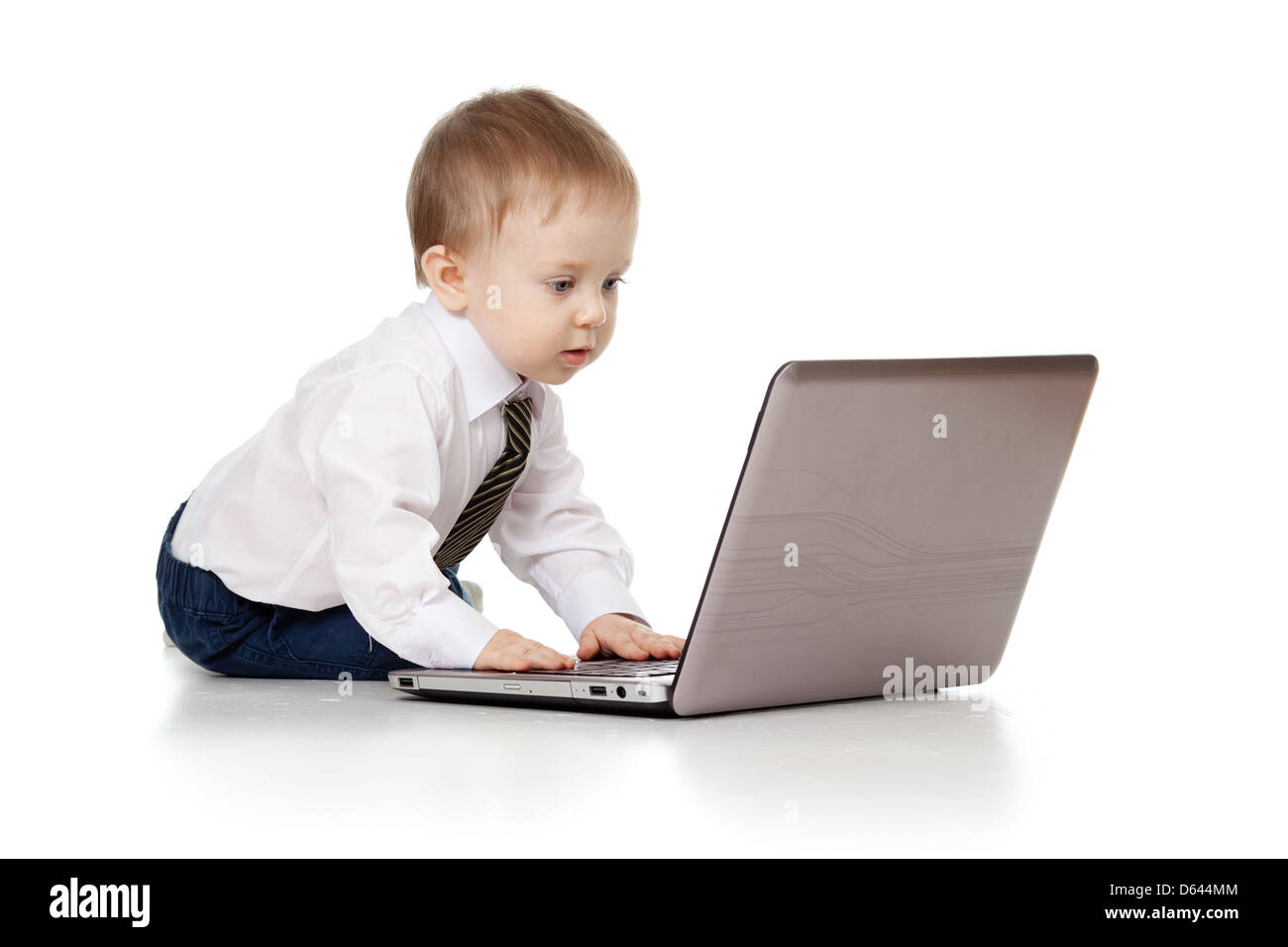 Child using a laptop Stock Photo - Alamy