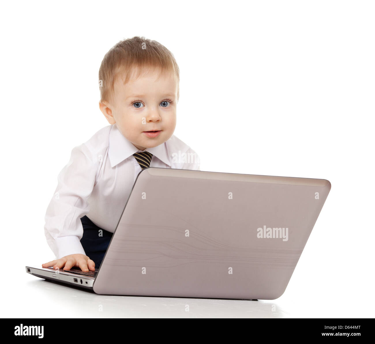 Child using a laptop Stock Photo - Alamy
