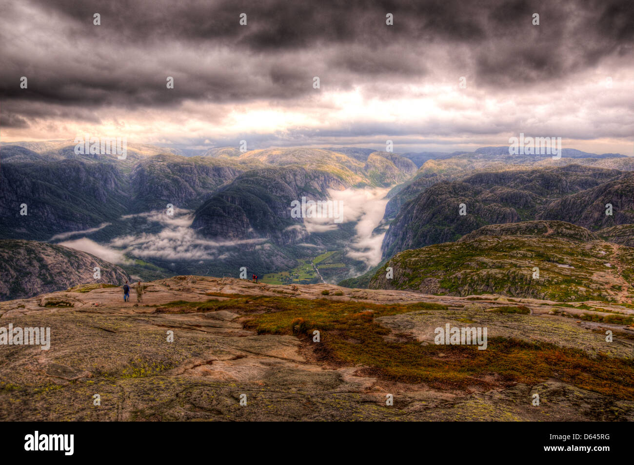 couple of tourists in mountains Stock Photo - Alamy