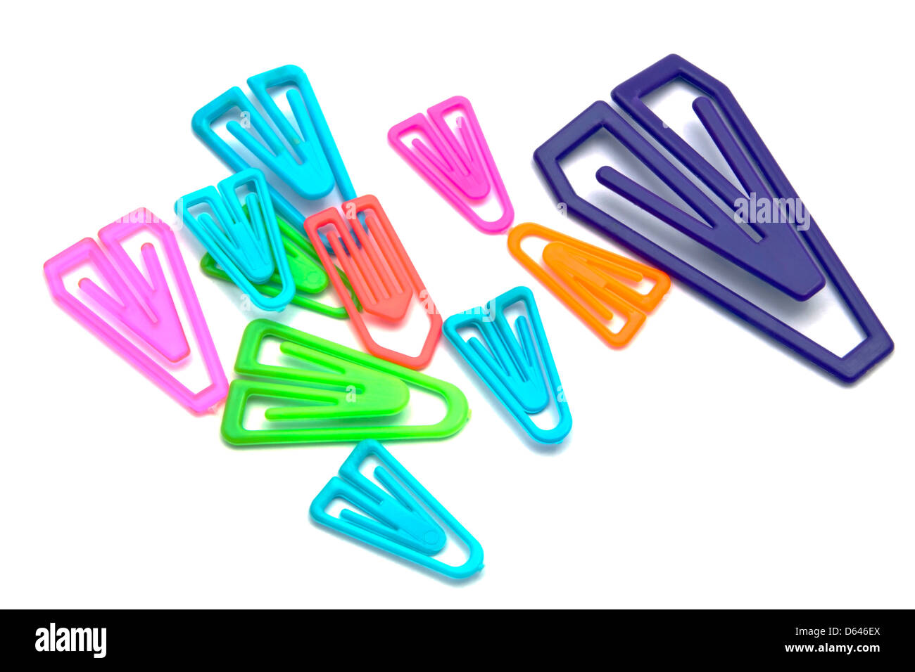 Colorful paper-clips isolated on white background Stock Photo - Alamy