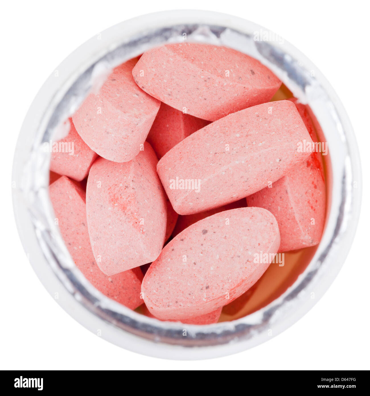 pink pills in white container close up isolated on white background ...